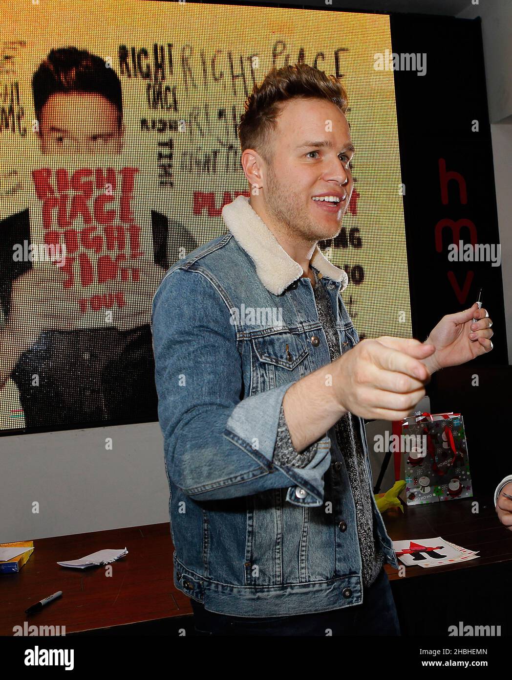 Olly Murs signs copies of his latest single, Hand On Heart, and album ...