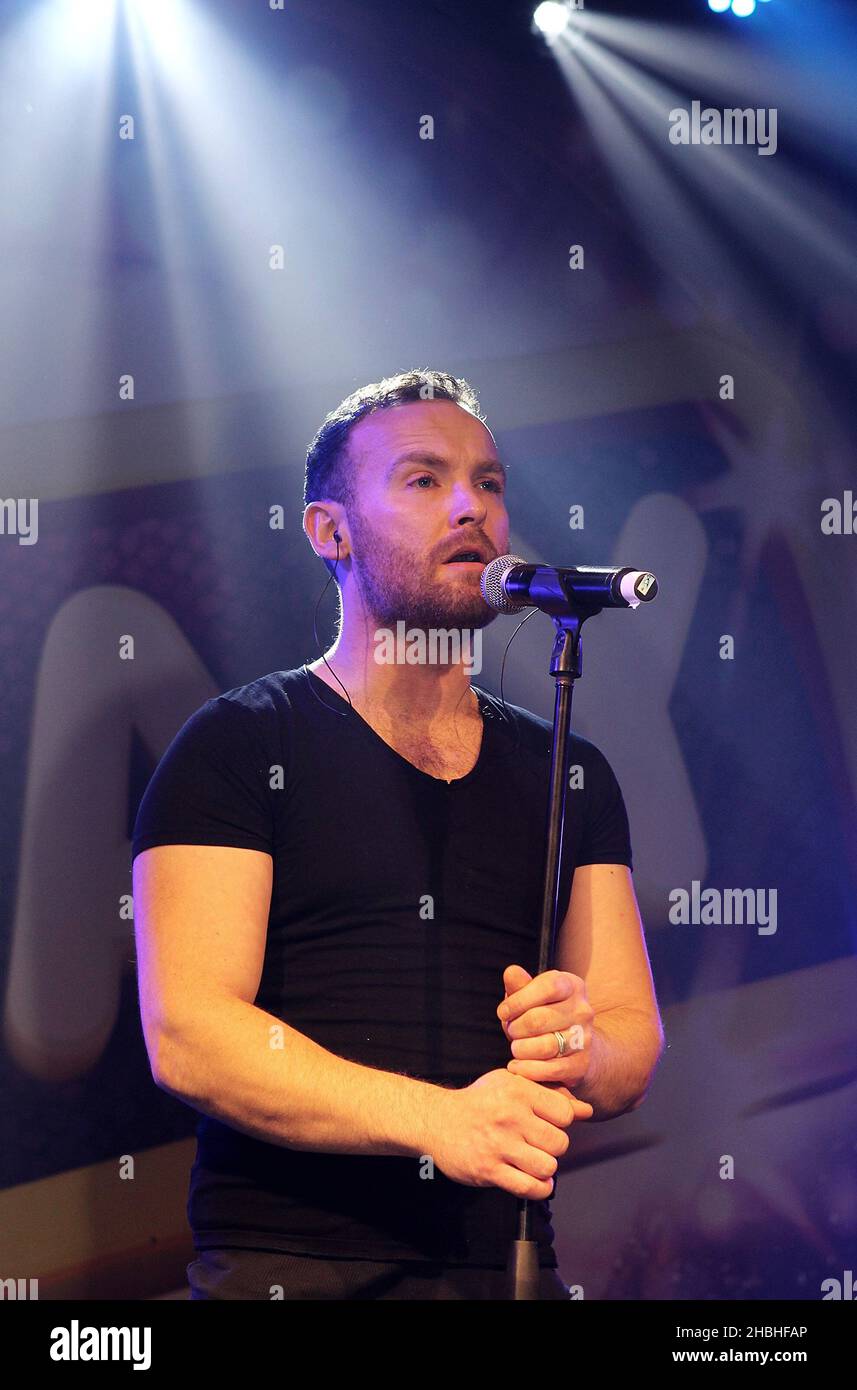 Kevin Simm performs on stage with Liberty X at G-A-Y Heaven in London ...