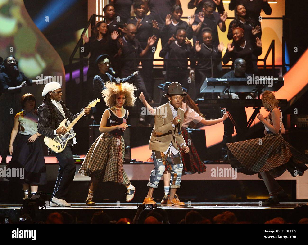 Nile Rodgers and Pharrell WIlliams on stage during the 2014 Brit Awards ...