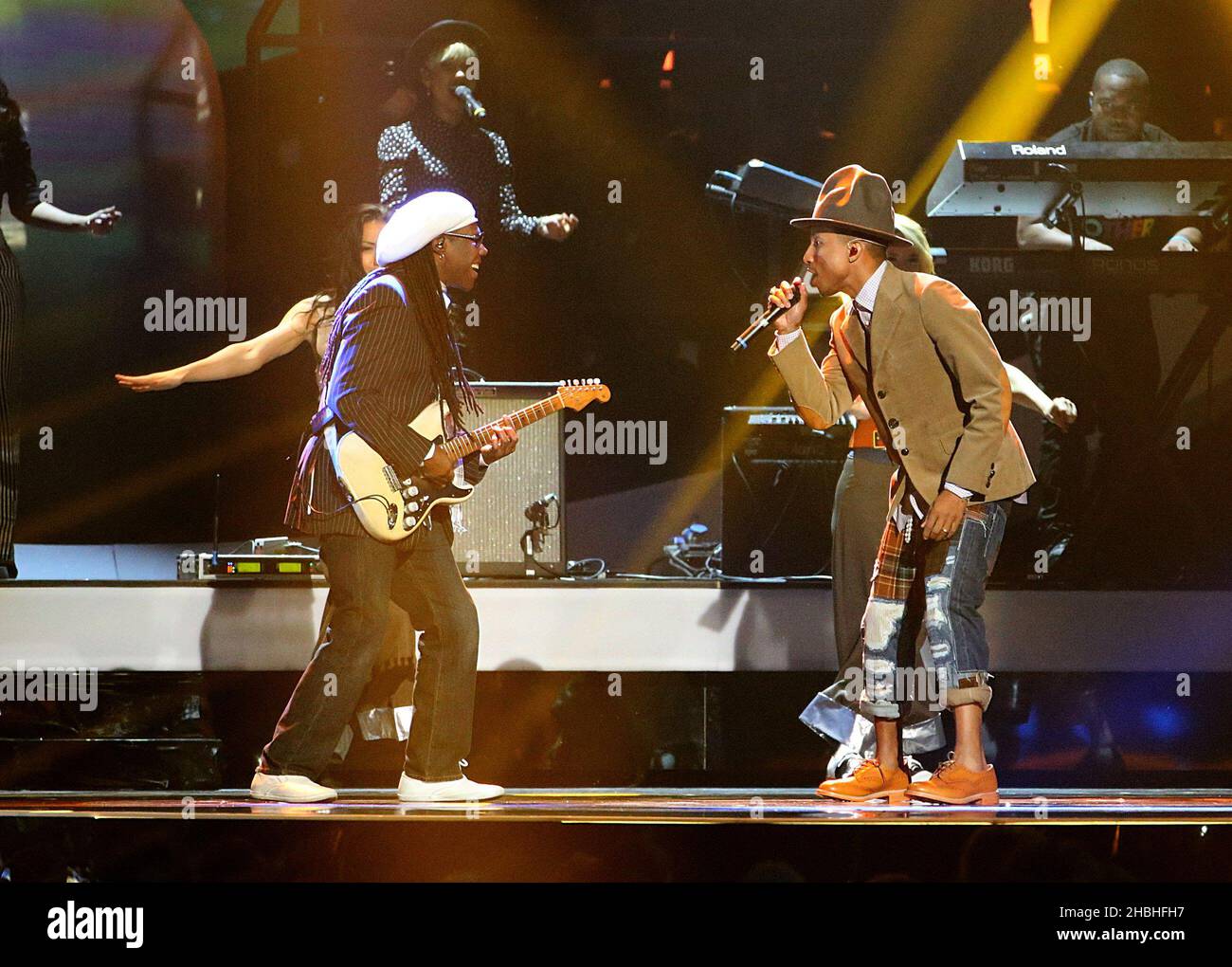 Nile Rodgers and Pharrell WIlliams on stage during the 2014 Brit Awards ...