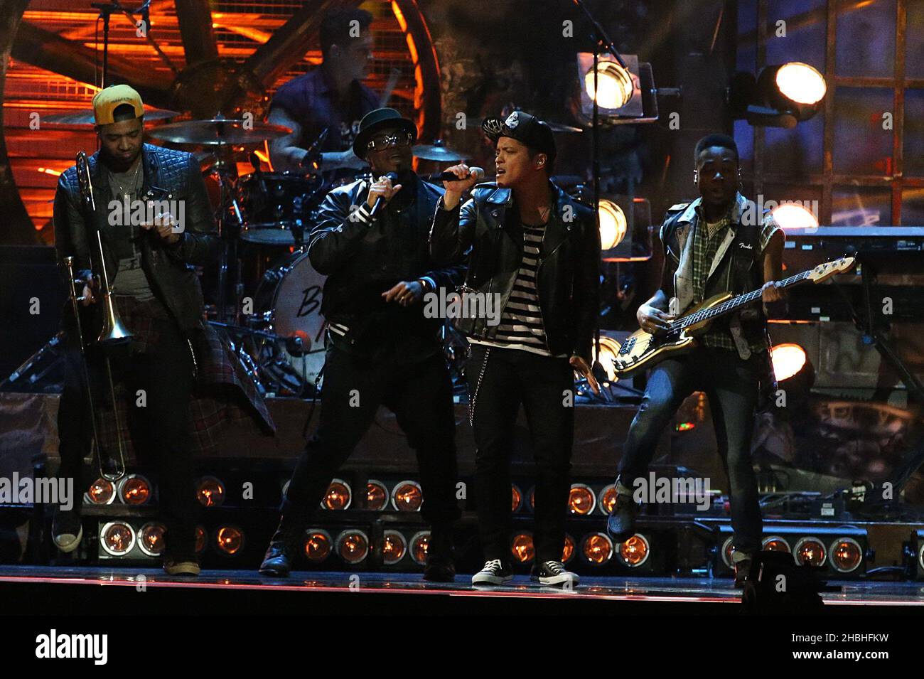 Bruno Mars performs on stage during the 2014 Brit Awards at the O2 ...