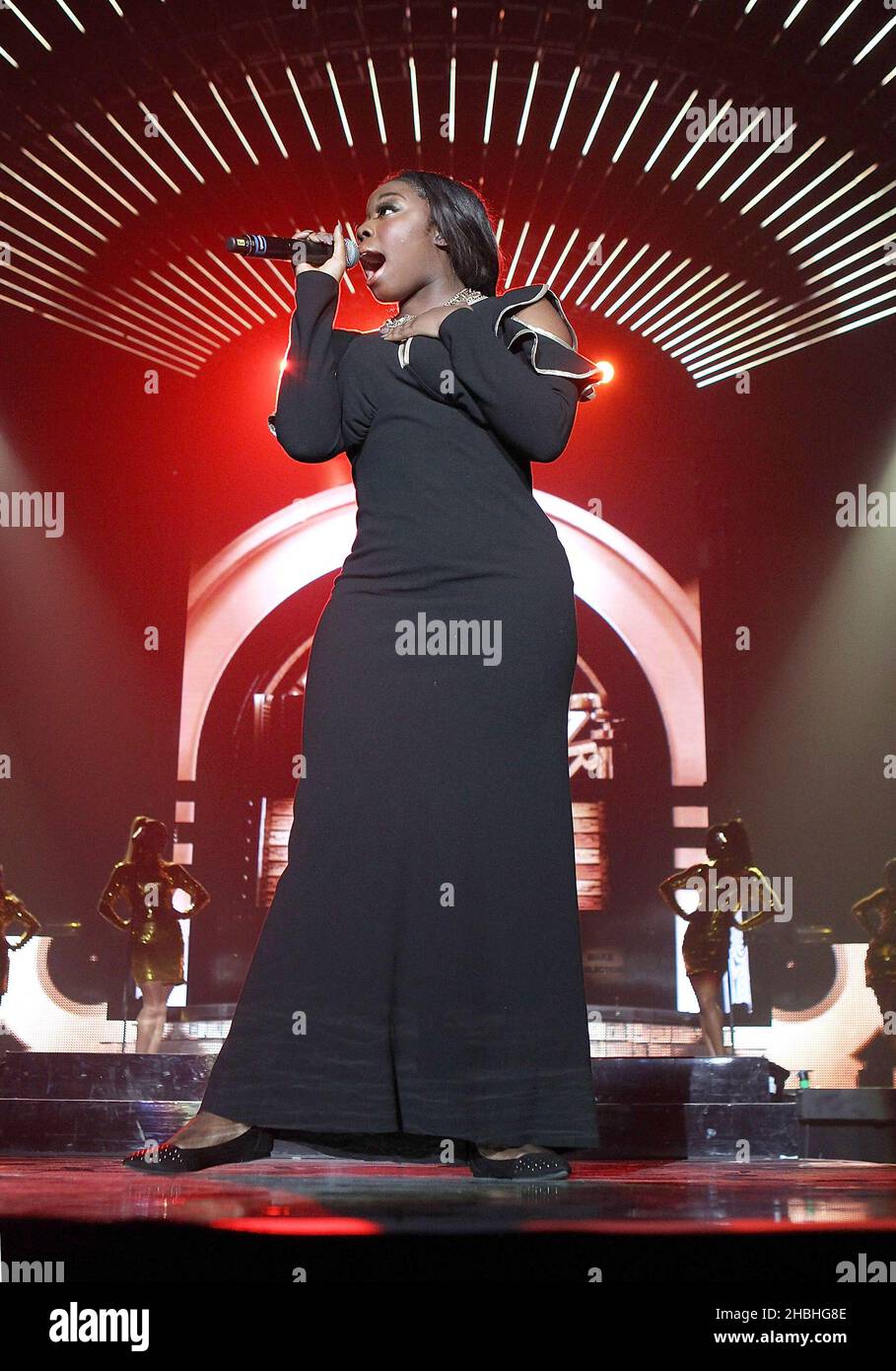 Hannah Barrett performs on stage at Wembley Arena during the X Factor ...