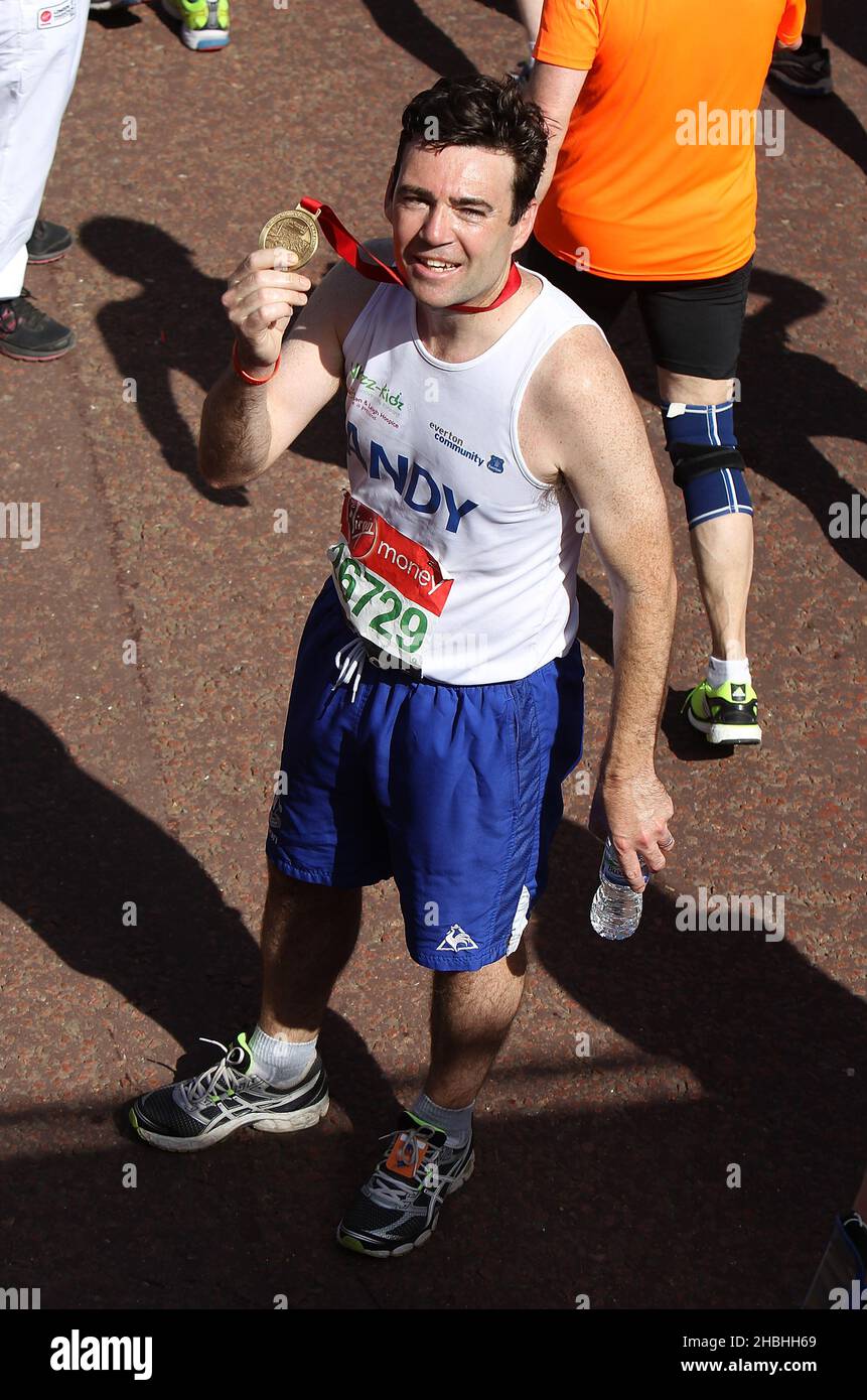 Andy Burnham MP with medal at the finishing line of the Virgin Money ...