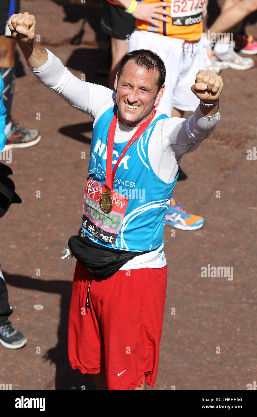 Nick Pickard Hollyoaks Actor with medal at the finishing line of the ...