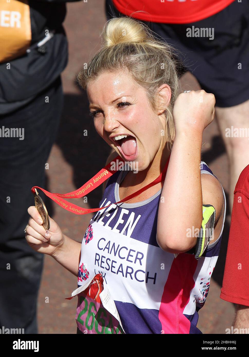 Helen Skelton with medal at the finishing line of the Virgin Money ...