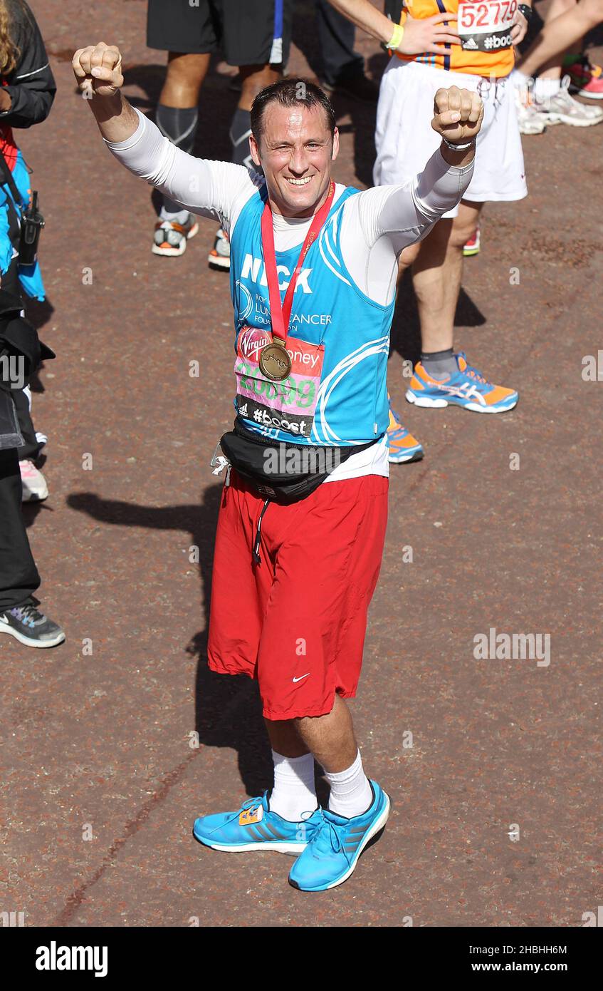 Nick Pickard Hollyoaks Actor with medal at the finishing line of the ...