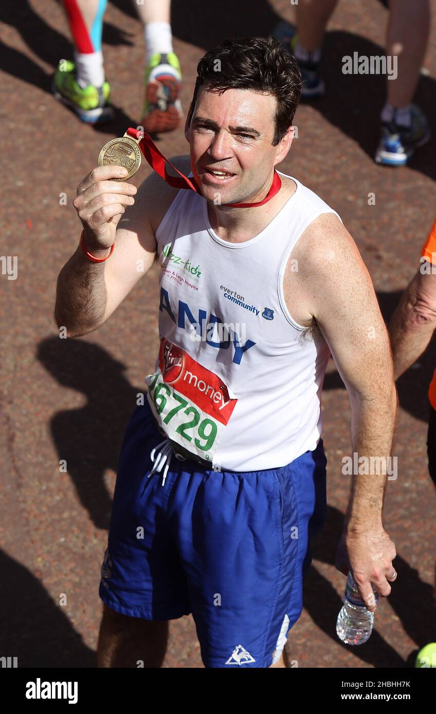 Andy Burnham MP with medal at the finishing line of the Virgin Money ...