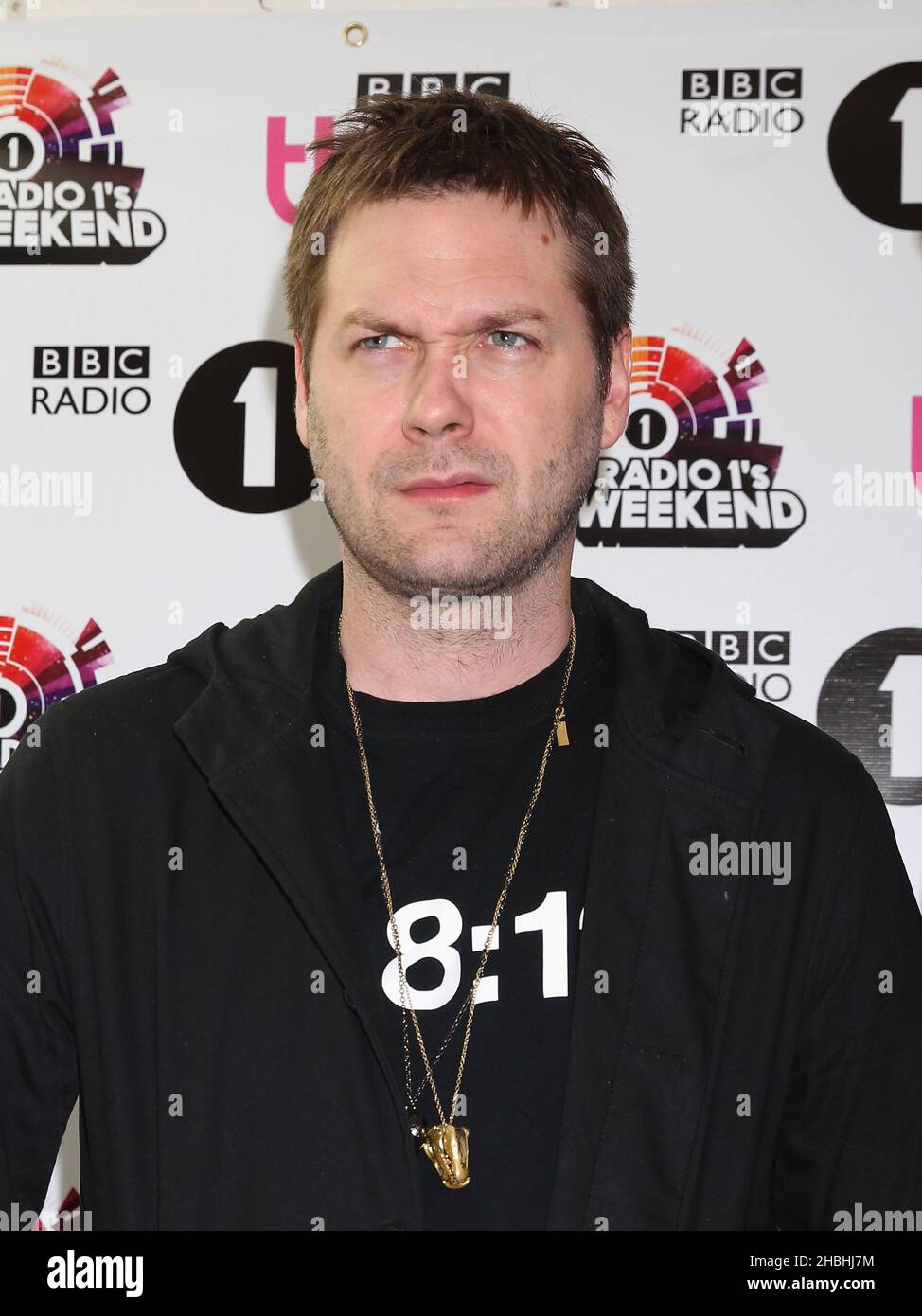 Tom Meighan of Kasabian poses backstage during the BBC Radio 1 Big ...