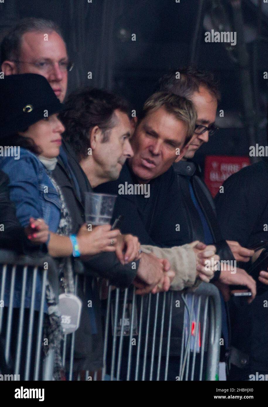 Shane Warne on side of stage waiting for Aerosmith to perform at the ...