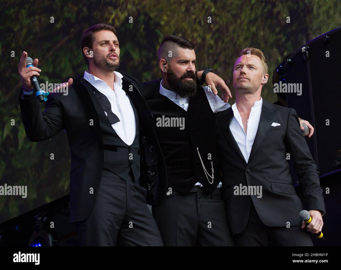 Keith Duffy,Shane Lynch and Ronan Keating of Boyzone perform on stage ...