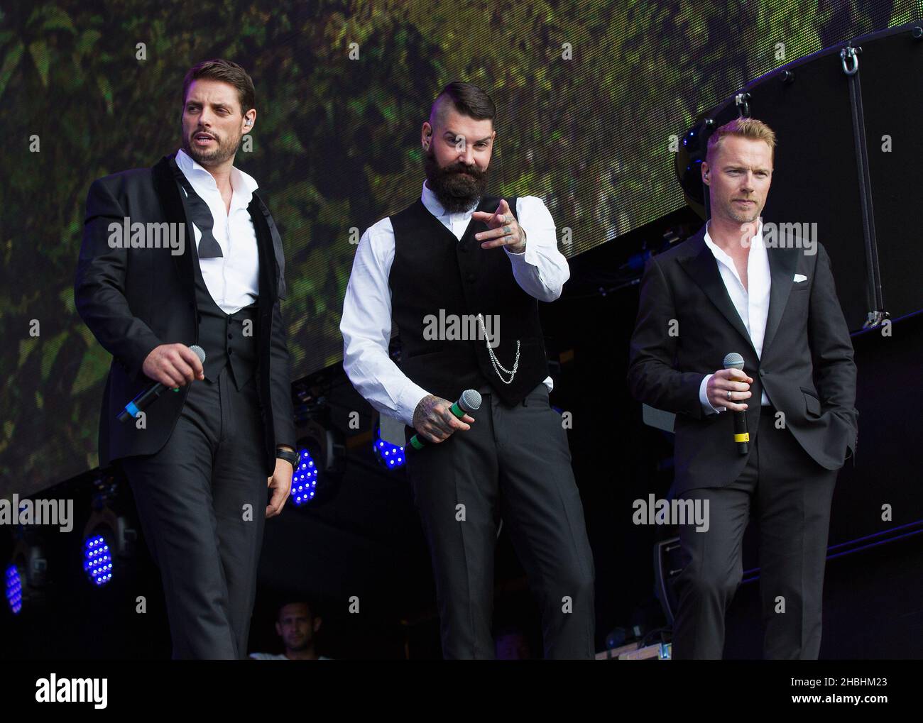 Keith Duffy,Shane Lynch and Ronan Keating of Boyzone perform on stage ...