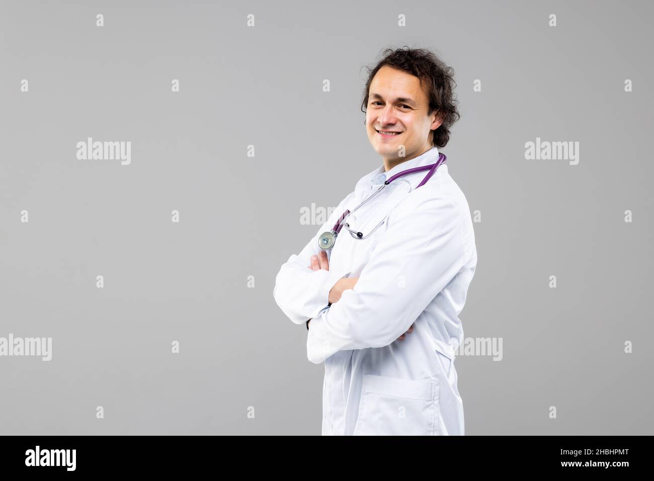 A portrait of a medical doctor posing against white background Stock ...