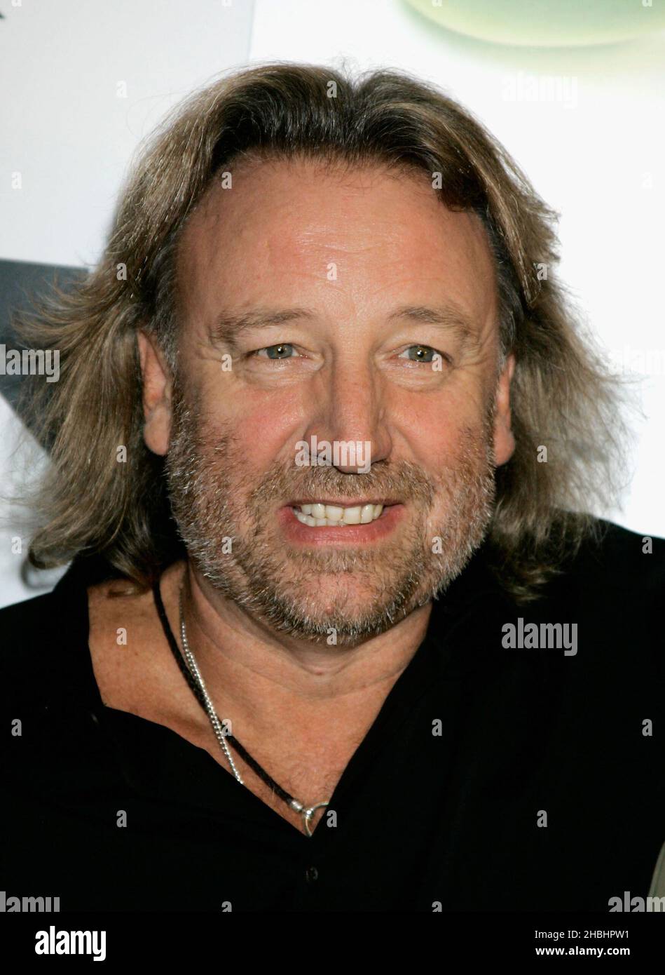 Peter Hook of New Order poses in press room with award and at the Hall ...