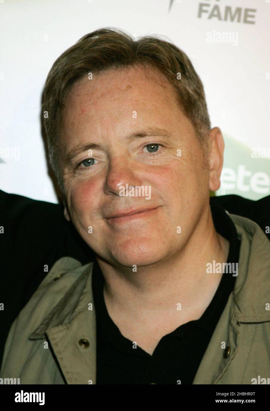 Bernard Sumner of New Order poses in press room with award and at the ...