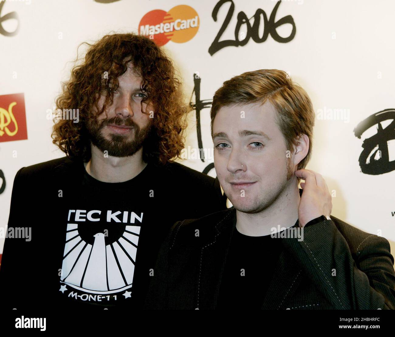 Simon Rix and Ricky wilson of the Kaiser Chiefs pose backstage at the ...