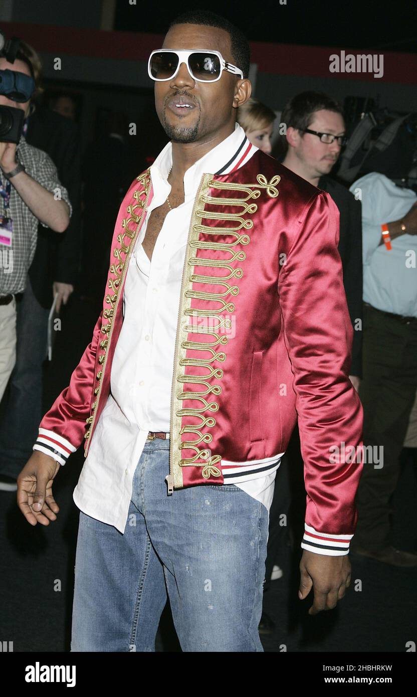 Kanye West and models in the press room at The 2006 Brit Awards at ...