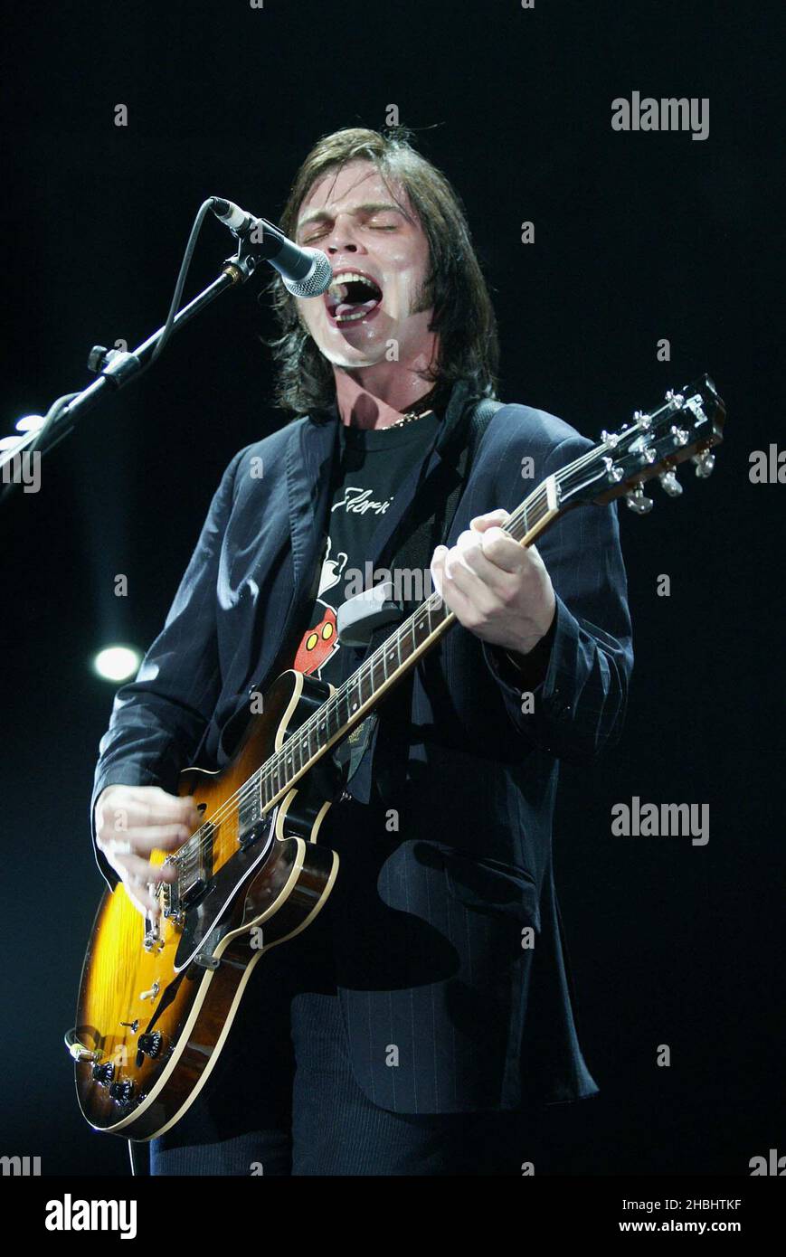 Supergrass performing live on stage at the Teenage Cancer Trust Concert ...