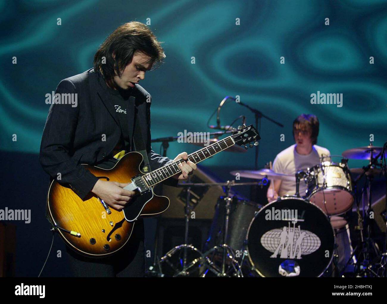 Supergrass performing live on stage at the Teenage Cancer Trust Concert ...