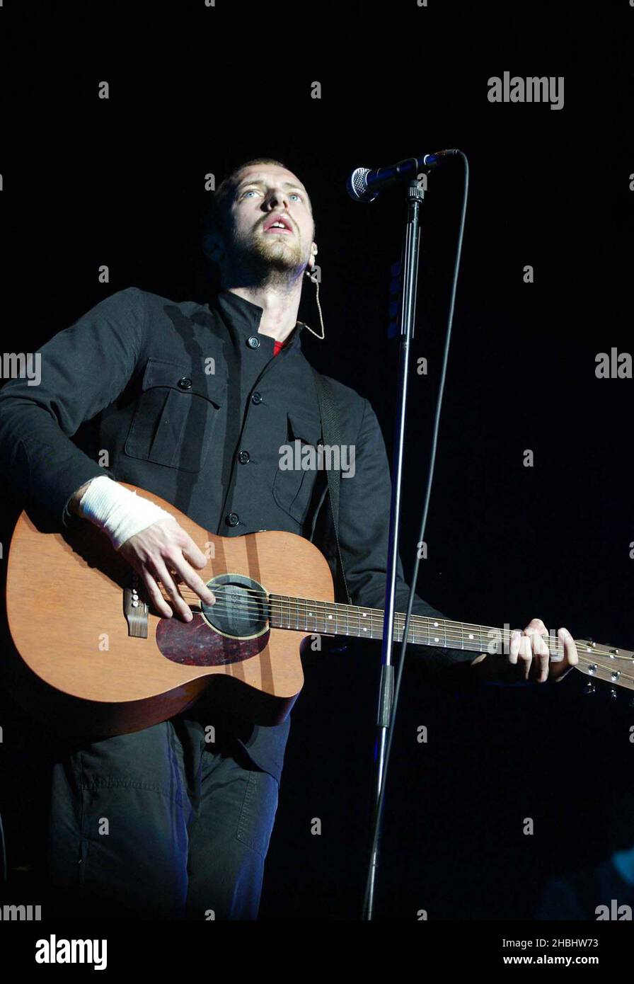 Coldplay perform live on stage at the Earls Court Exhibition Centre ...