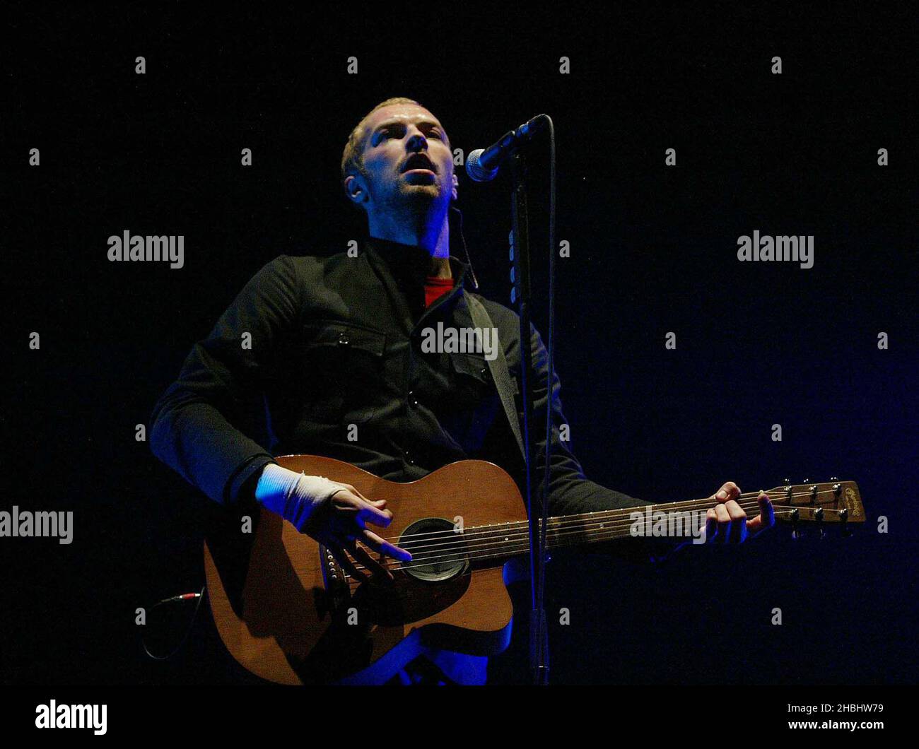 Coldplay perform live on stage at the Earls Court Exhibition Centre ...