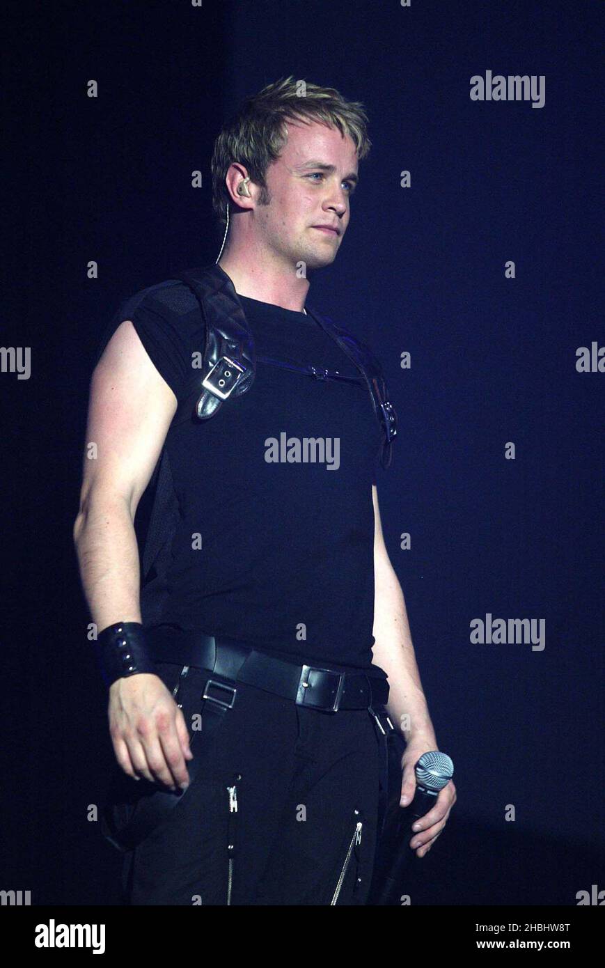 Westlife perform live at the London Arena. Half length, Kian Egan Stock ...