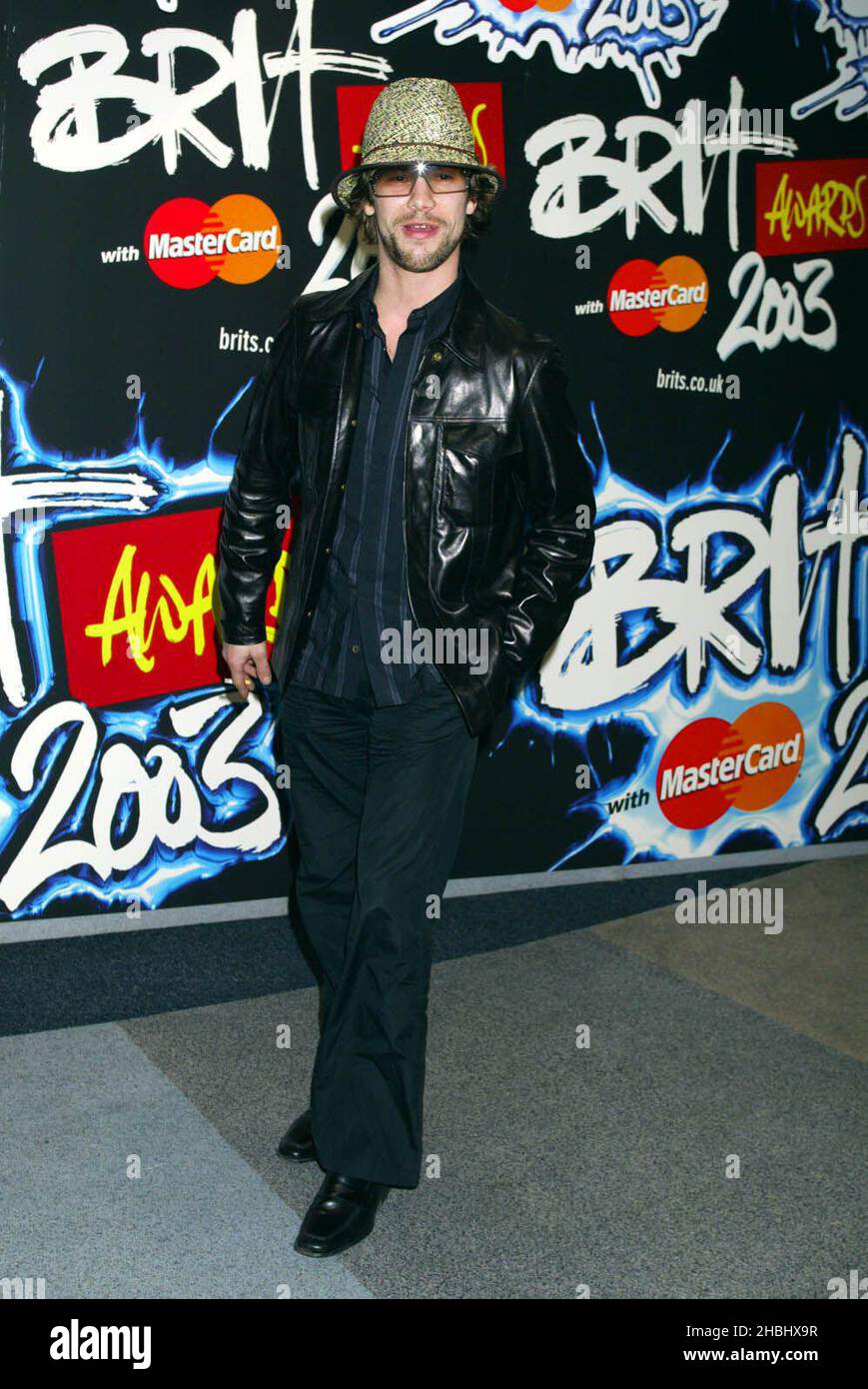 Jay Kay photographed at the 2003 Brit Awards in London. full length ...