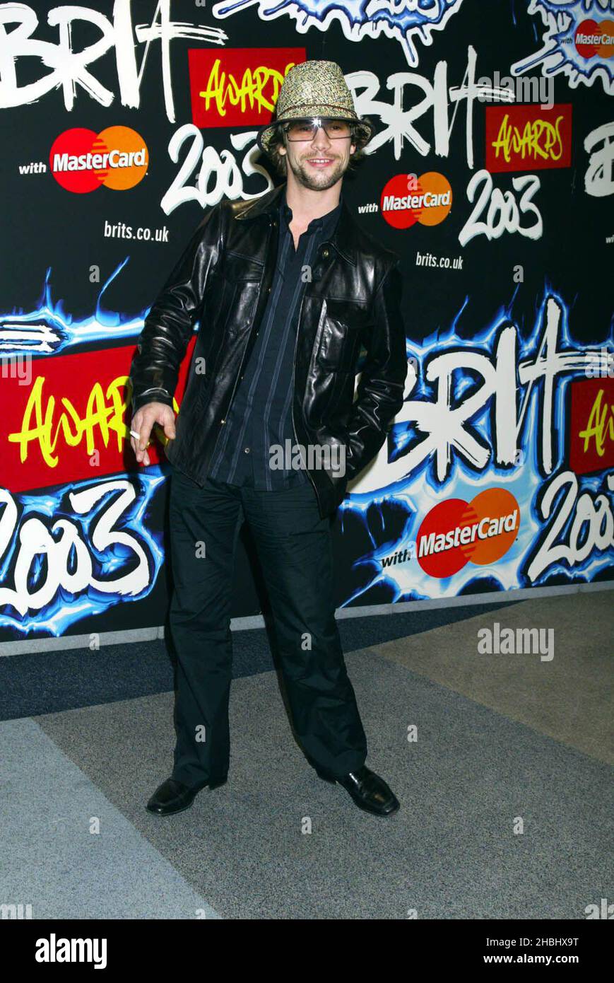 Jay Kay photographed at the 2003 Brit Awards in London. full length ...