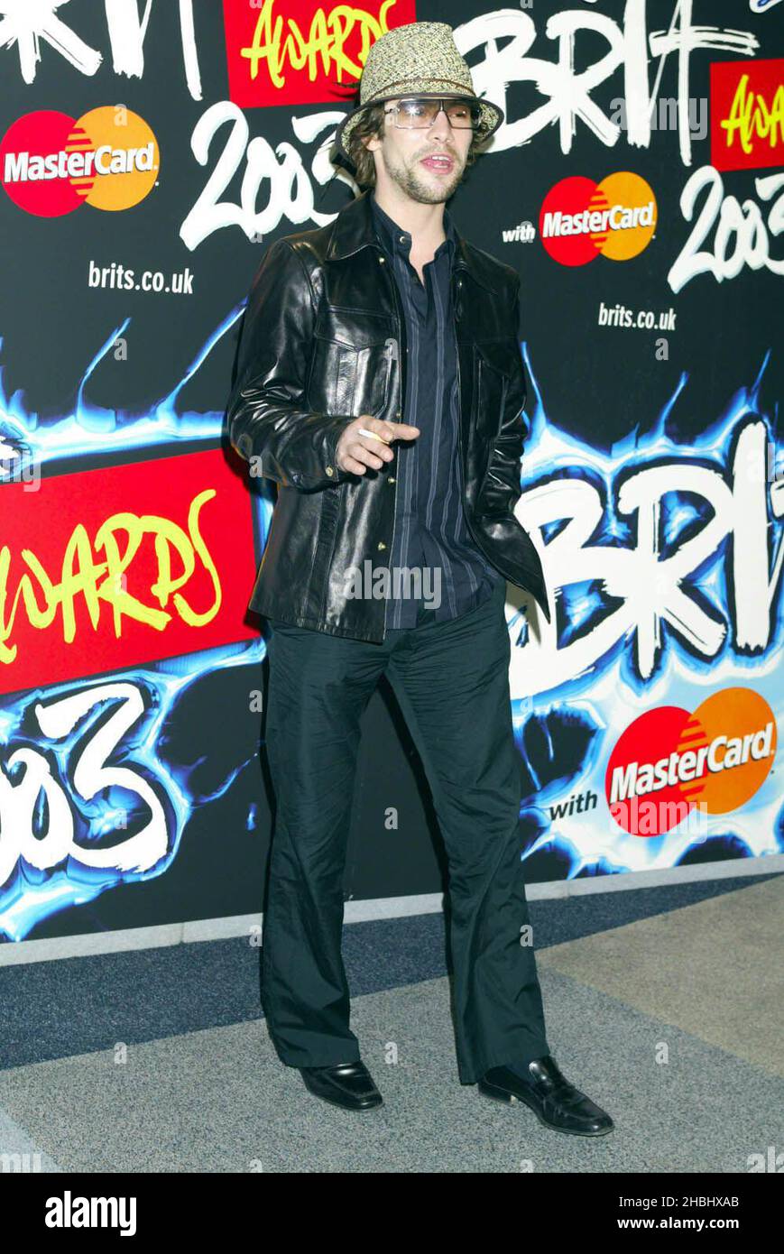 Jay Kay photographed at the 2003 Brit Awards in London. full length ...