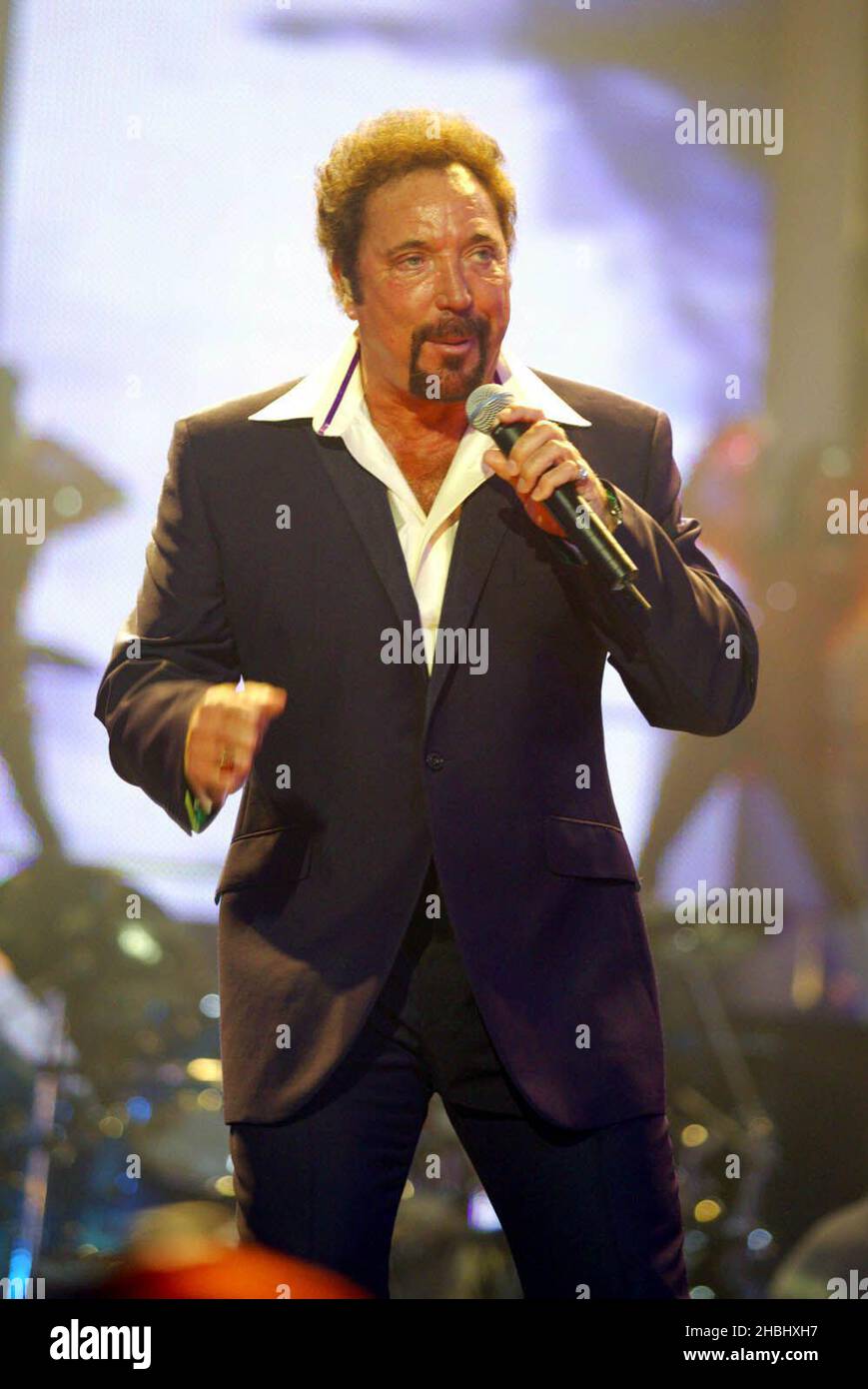 Tom Jones photographed at the 2003 Brit Awards in London. 3/4 length ...