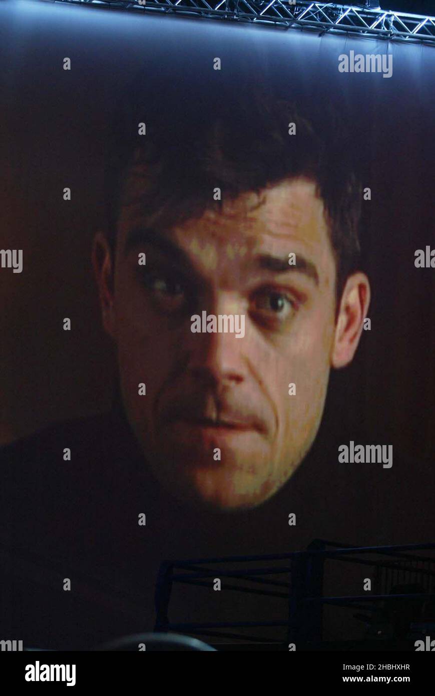 Robbie Williams on video link at the 2003 Brit Awards at Earls Court in ...