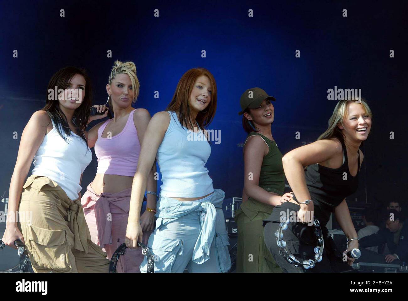 Girls Aloud perfom live at Summer XS in Reading. Half length, cap Stock ...