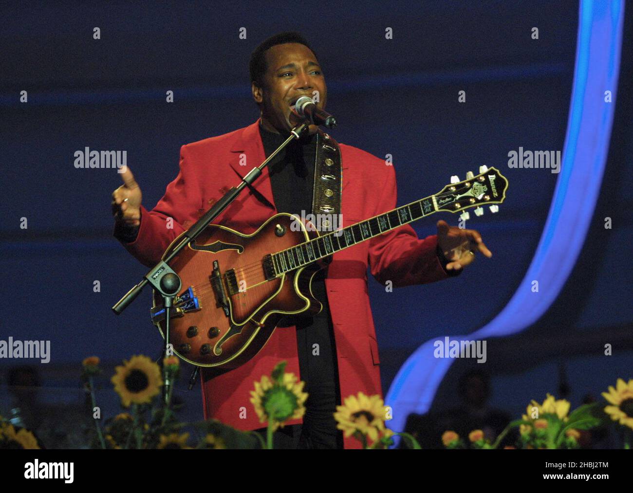 George Bensen on stage at the Pavarotti and friends concert in Modena ...