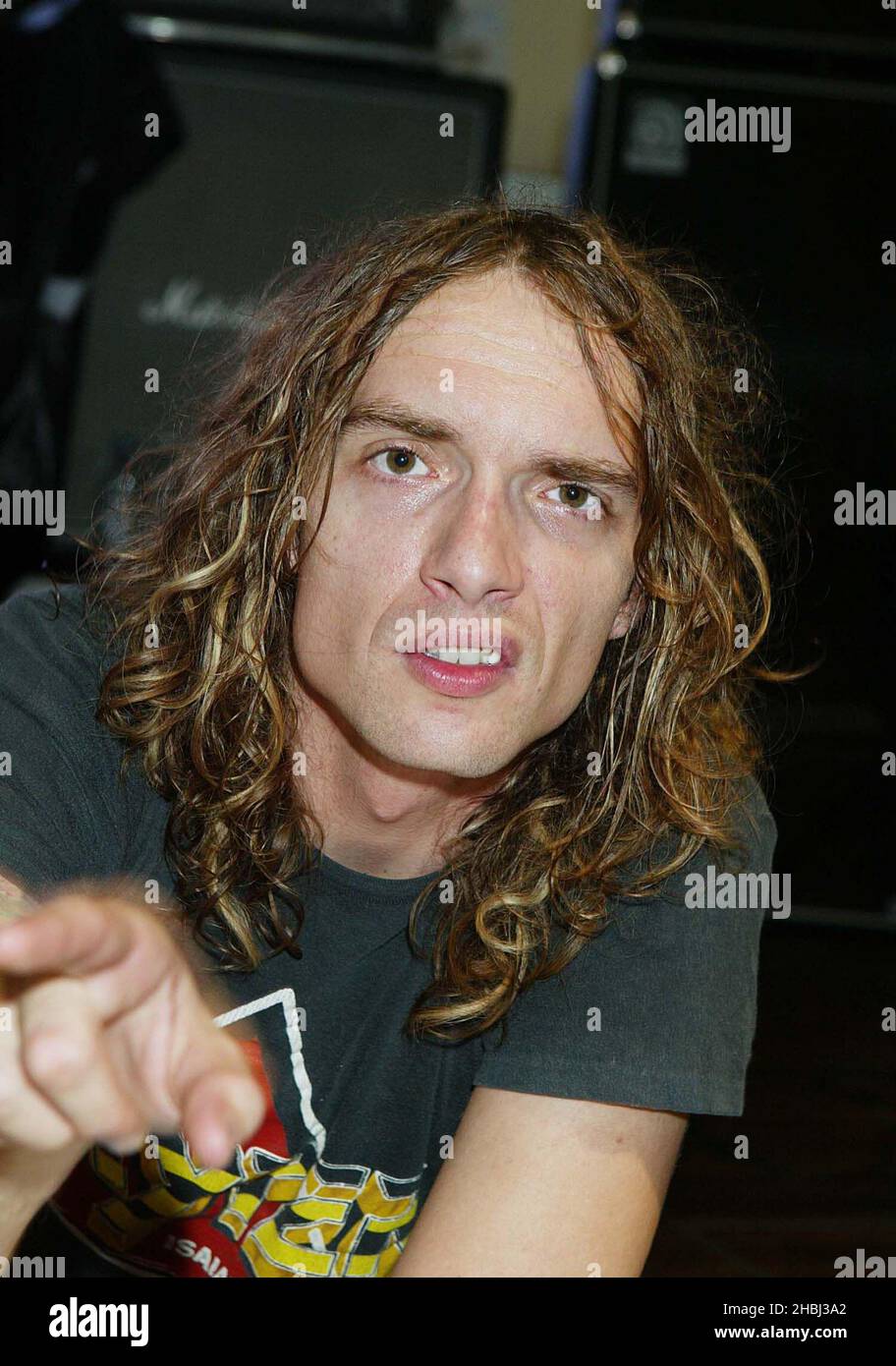 The Darkness vocalist Justin posed head shot at their signing of ...