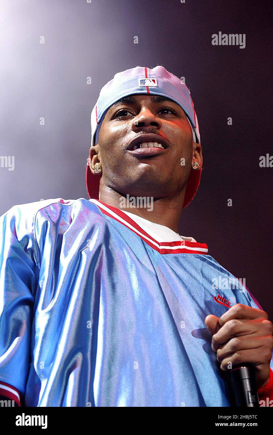 Nelly performs live on stage at the Wembley Arena,wearing blue silky ...