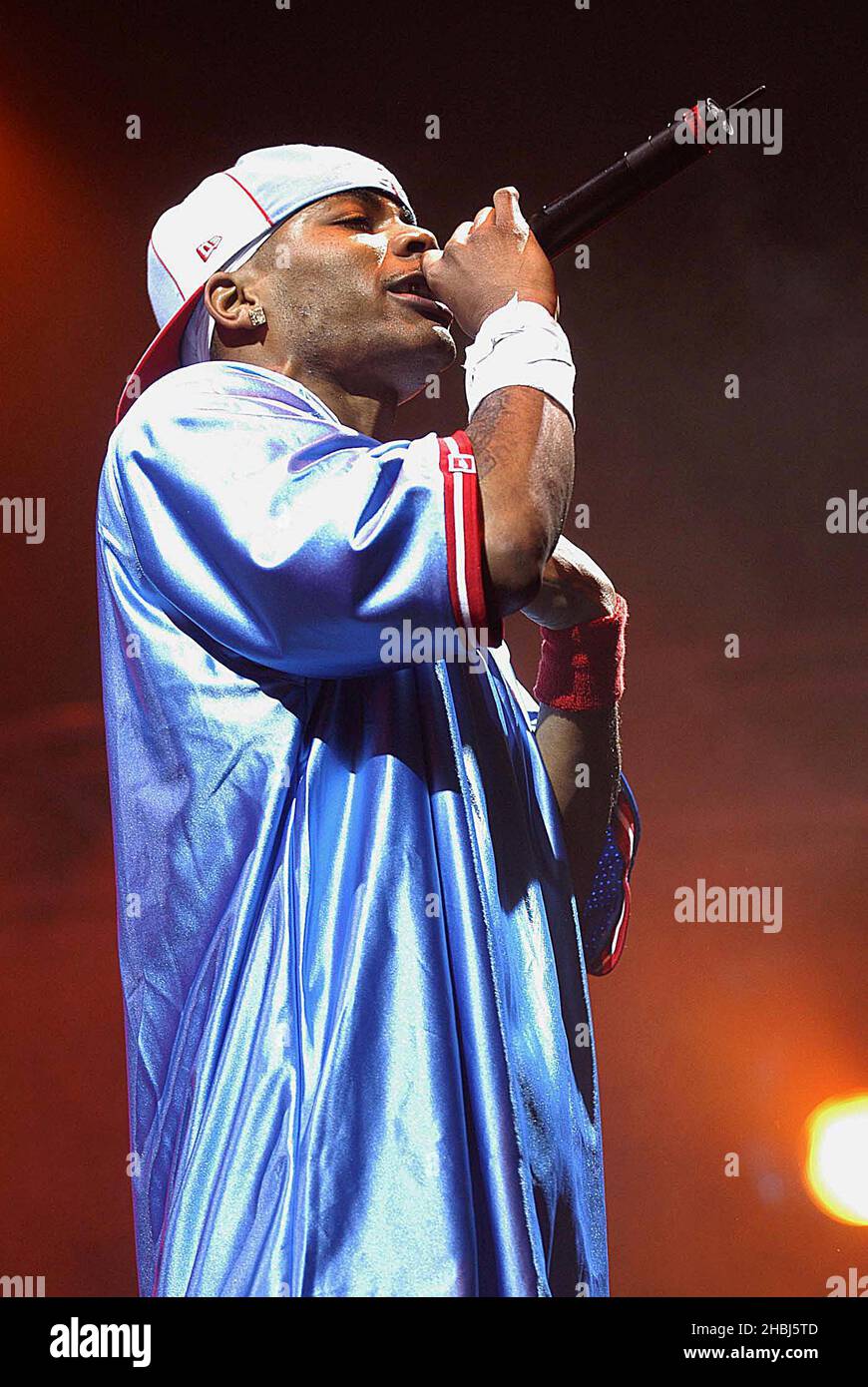 Nelly performs live on stage at the Wembley Arena,wearing blue silky ...