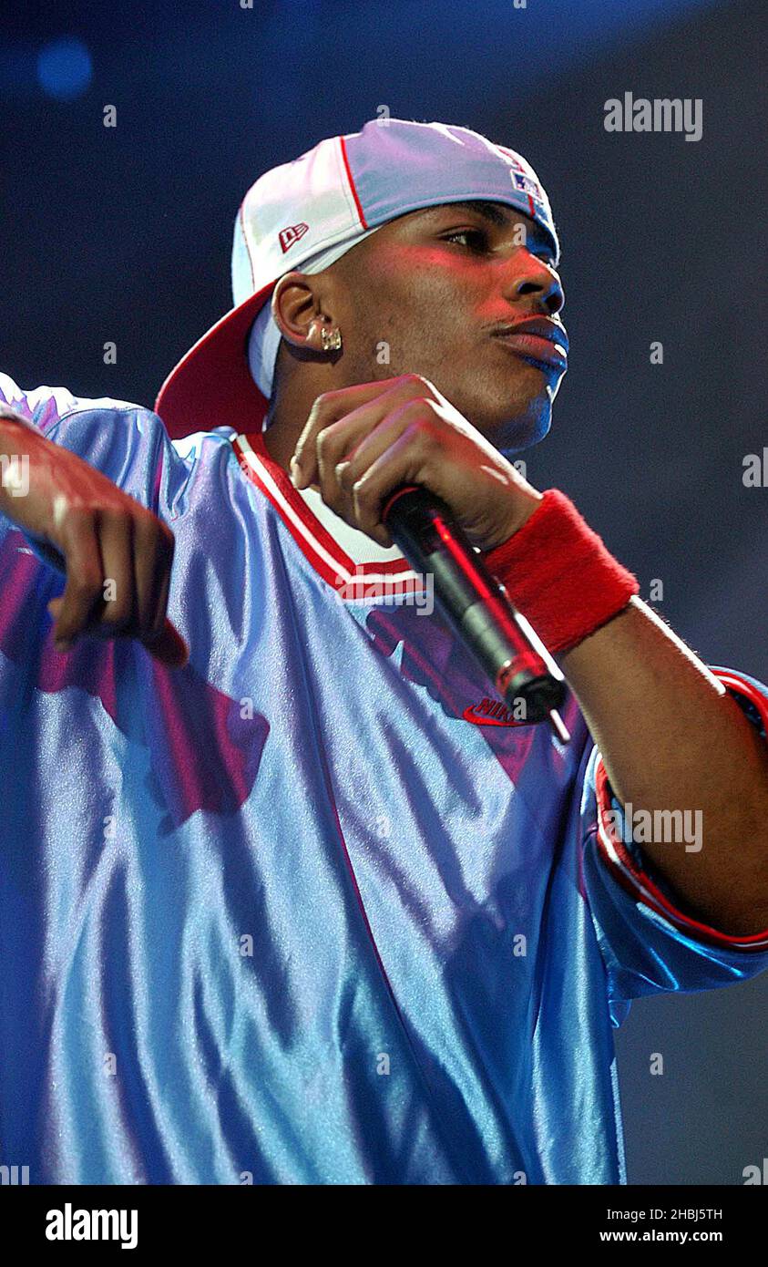 Nelly performs live on stage at the Wembley Arena,wearing blue silky ...
