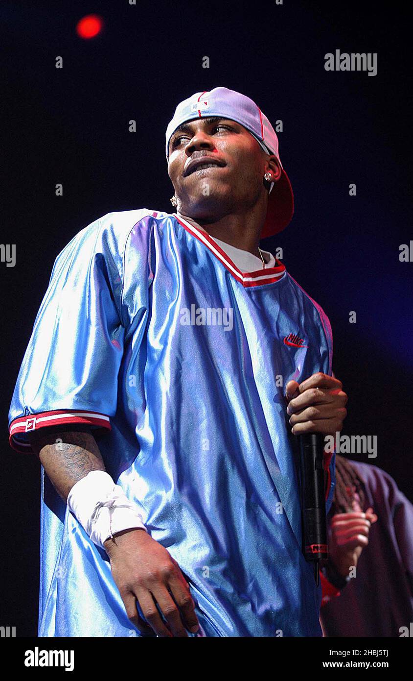 Nelly performs live on stage at the Wembley Arena,wearing blue silky ...