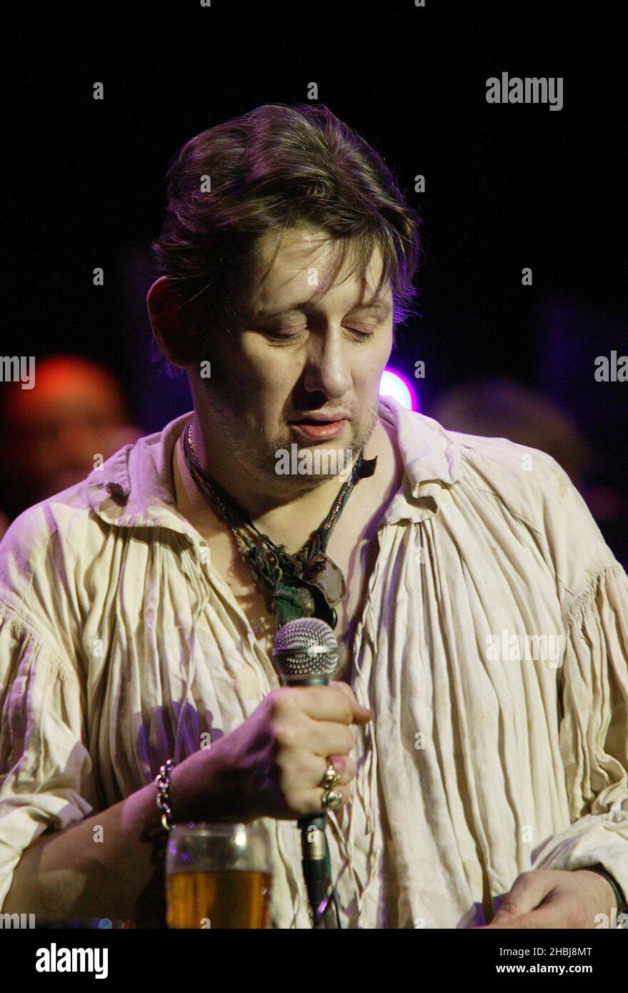 Shane MacGowan performs on stage with Jools Holland during the fourth ...