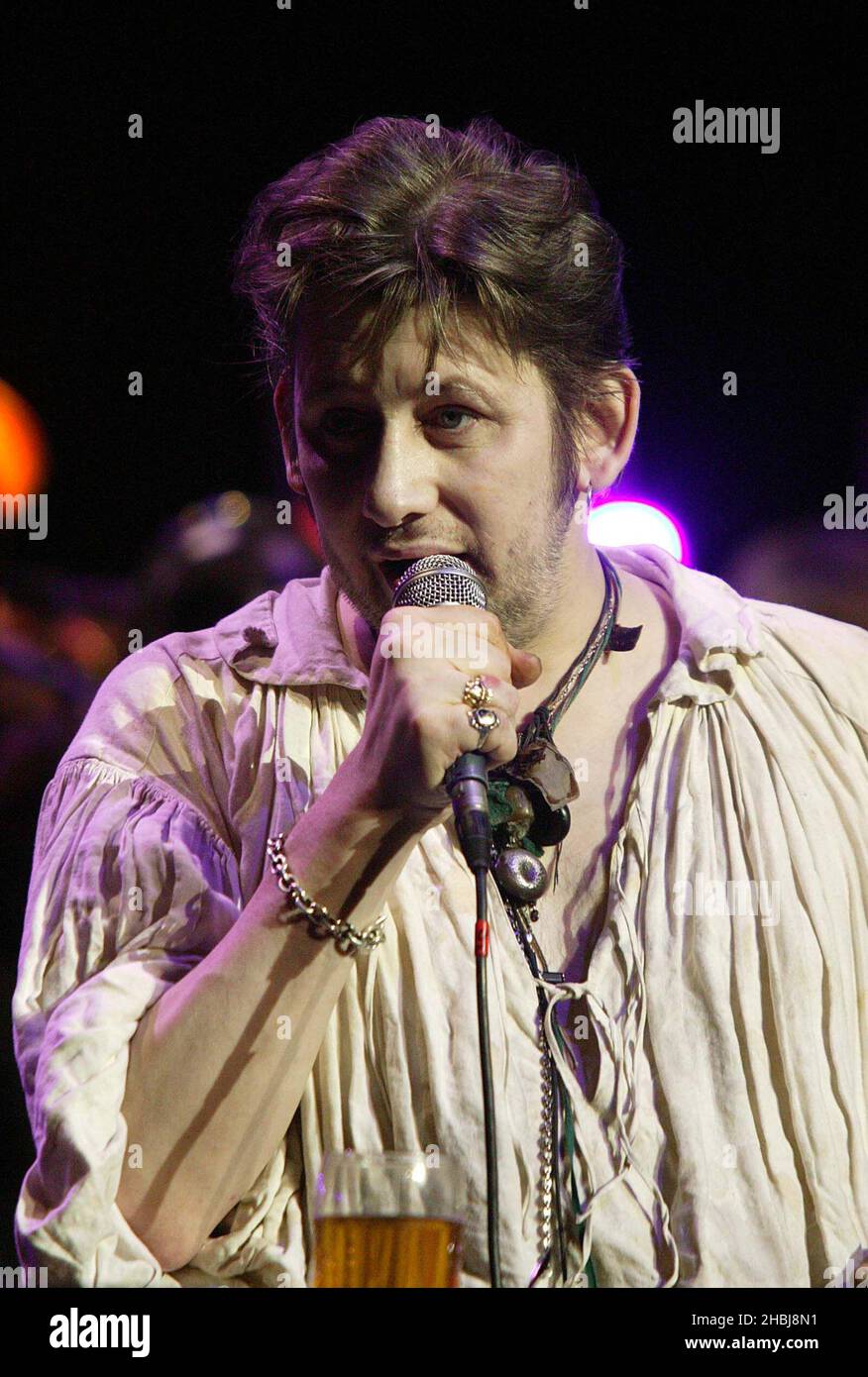 Shane MacGowan performs on stage with Jools Holland during the fourth ...