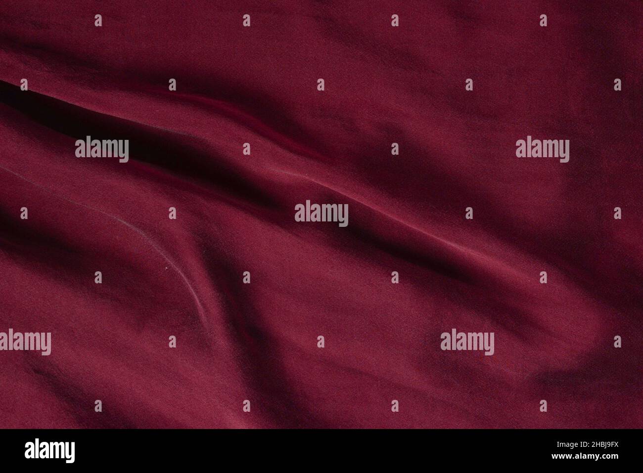 Soft smooth burgundy silk fabric background. Fabric texture Stock Photo ...