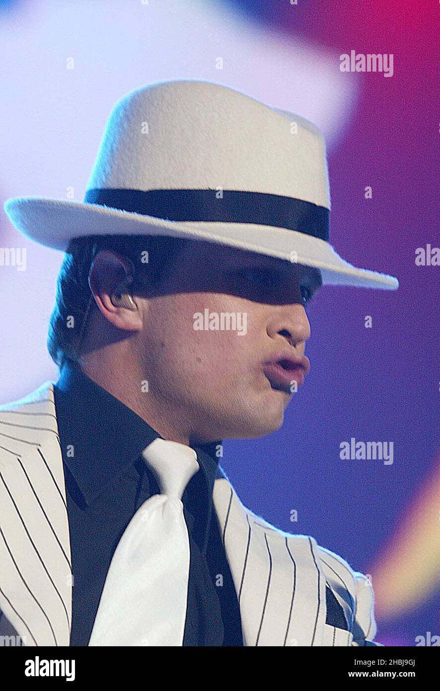 Westlife quartet less Brian McFadden perform on stage promoting their ...