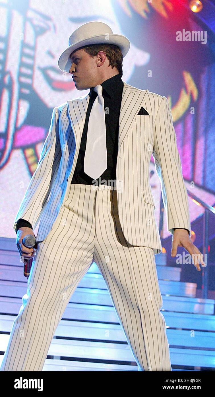 Westlife quartet less Brian McFadden perform on stage promoting their ...