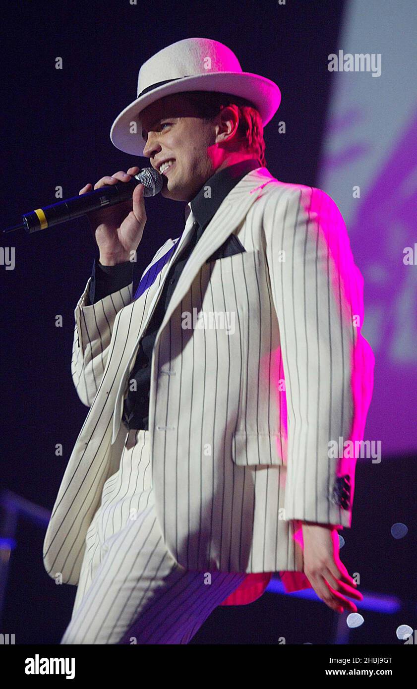 Westlife quartet less Brian McFadden perform on stage promoting their ...