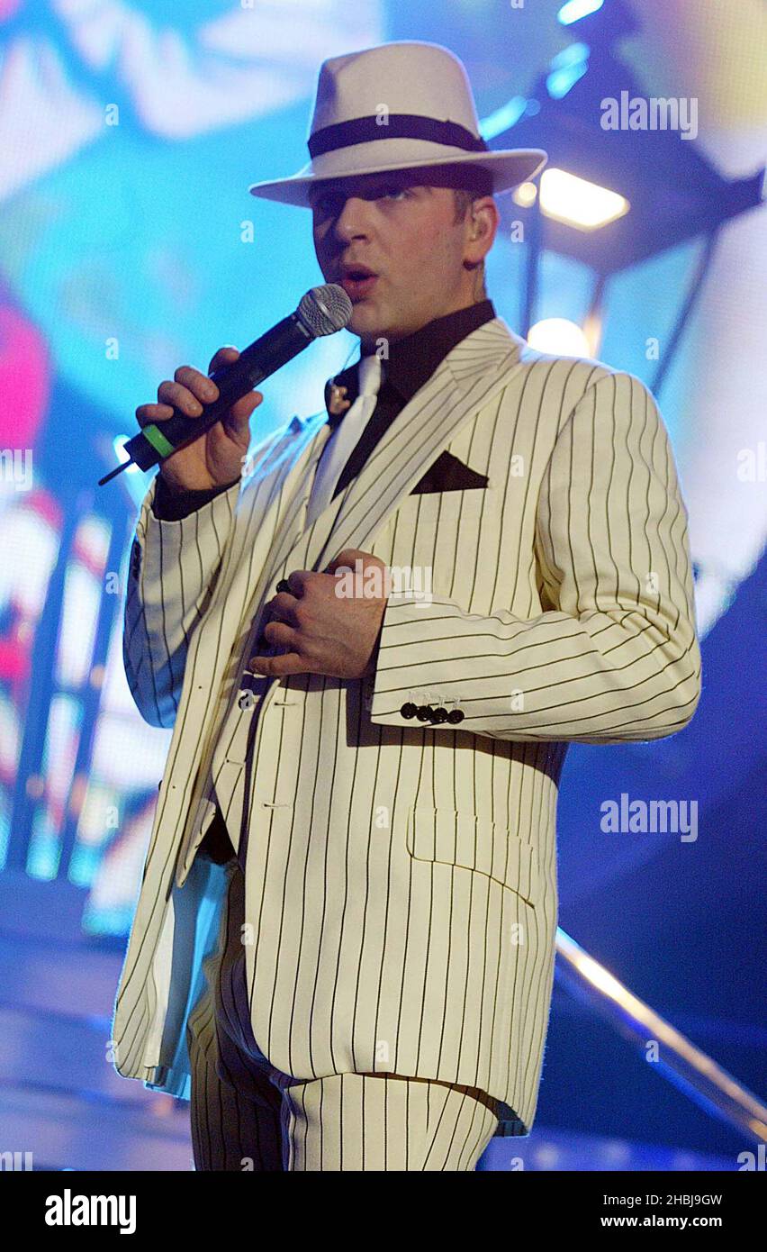 Westlife quartet less Brian McFadden perform on stage promoting their ...