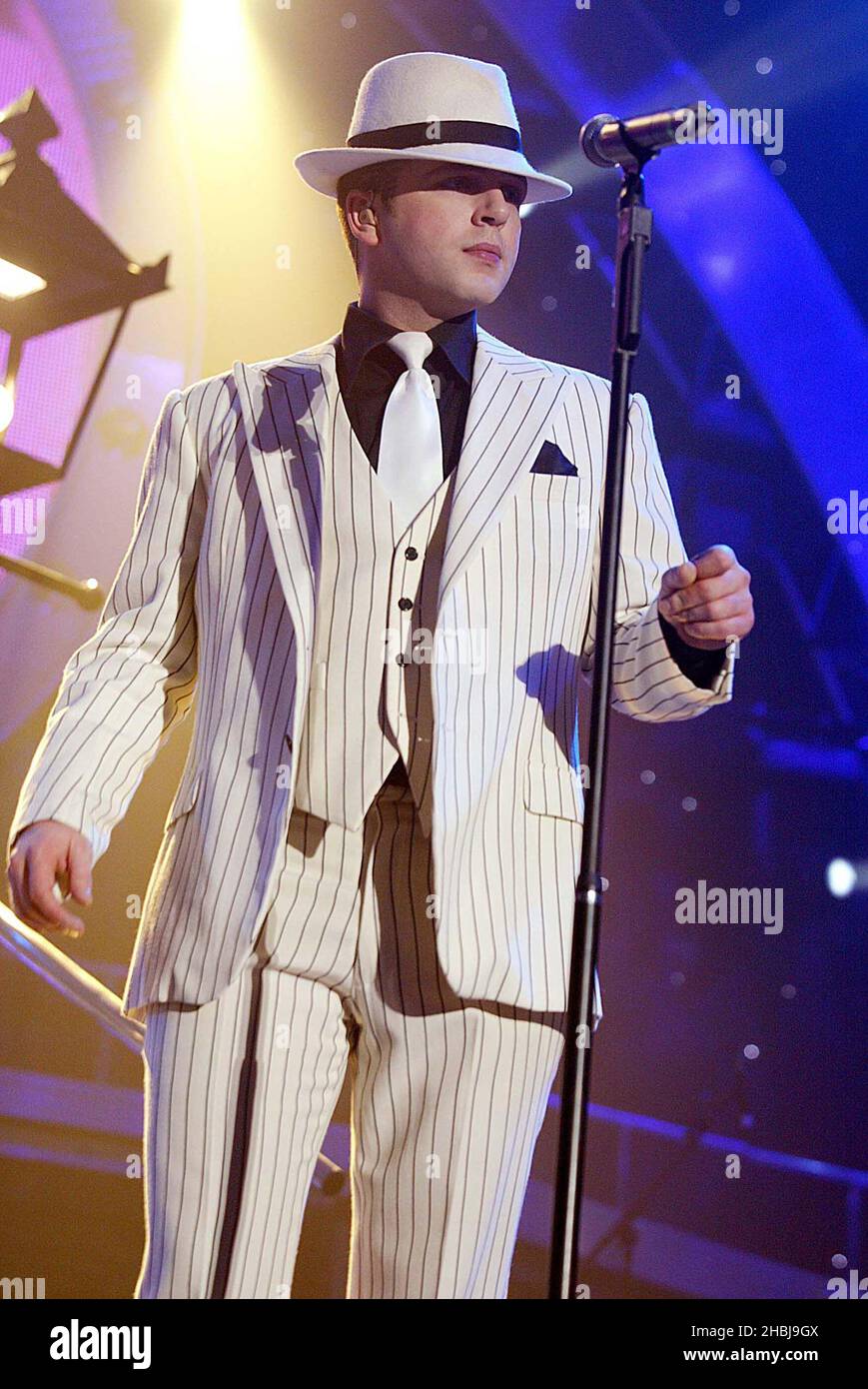 Westlife quartet less Brian McFadden perform on stage promoting their ...