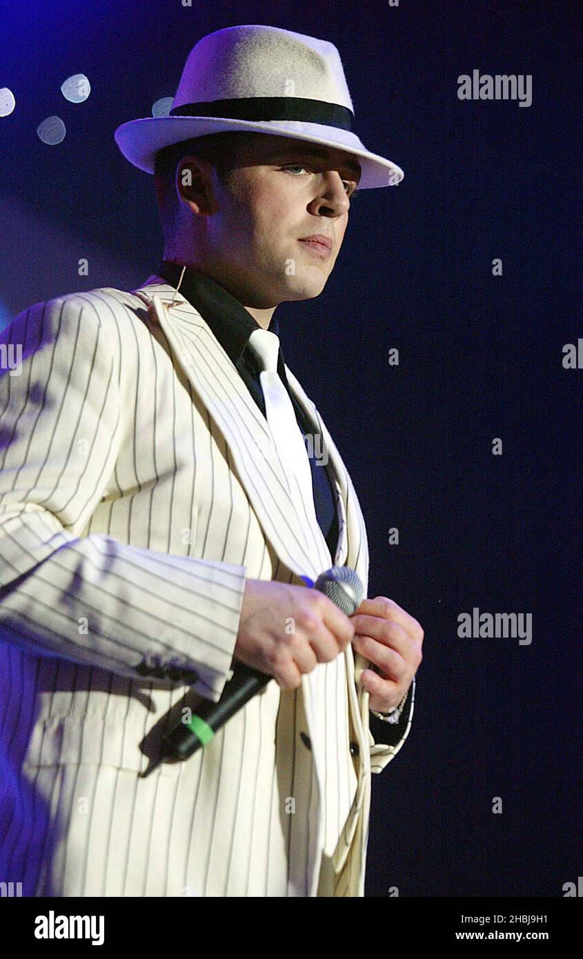 Westlife quartet less Brian McFadden perform on stage promoting their ...