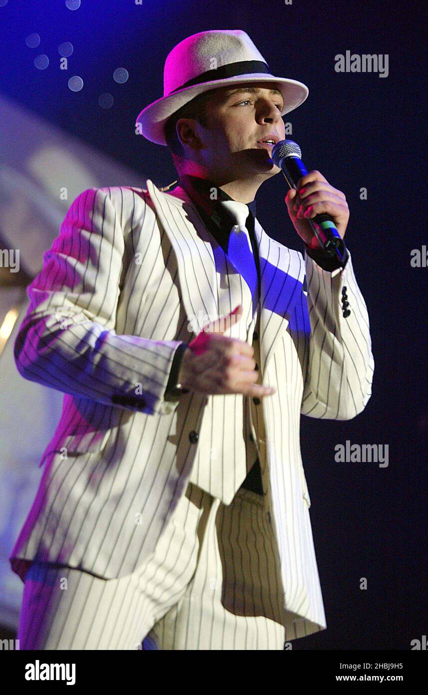 Westlife quartet less Brian McFadden perform on stage promoting their ...