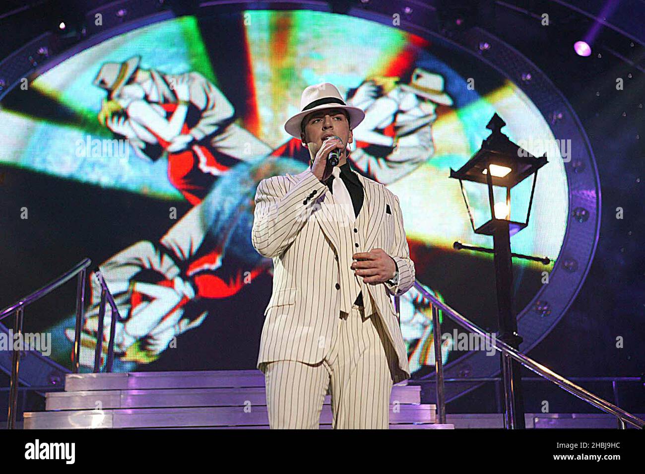 Westlife quartet less Brian McFadden perform on stage promoting their ...