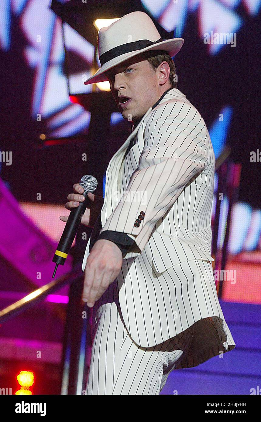 Westlife quartet less Brian McFadden perform on stage promoting their ...