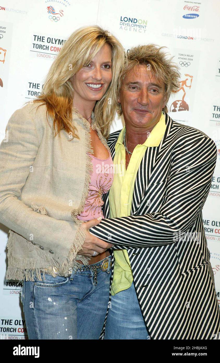 Penny Lancaster and Rod Stewart poses backstage at the Olympic Torch ...
